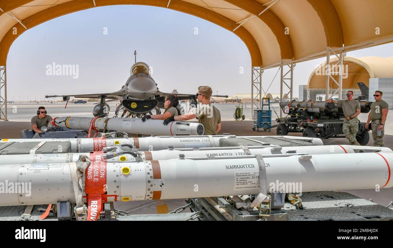 U.S. Air Force munitions systems specialists, assigned to the 179th ...