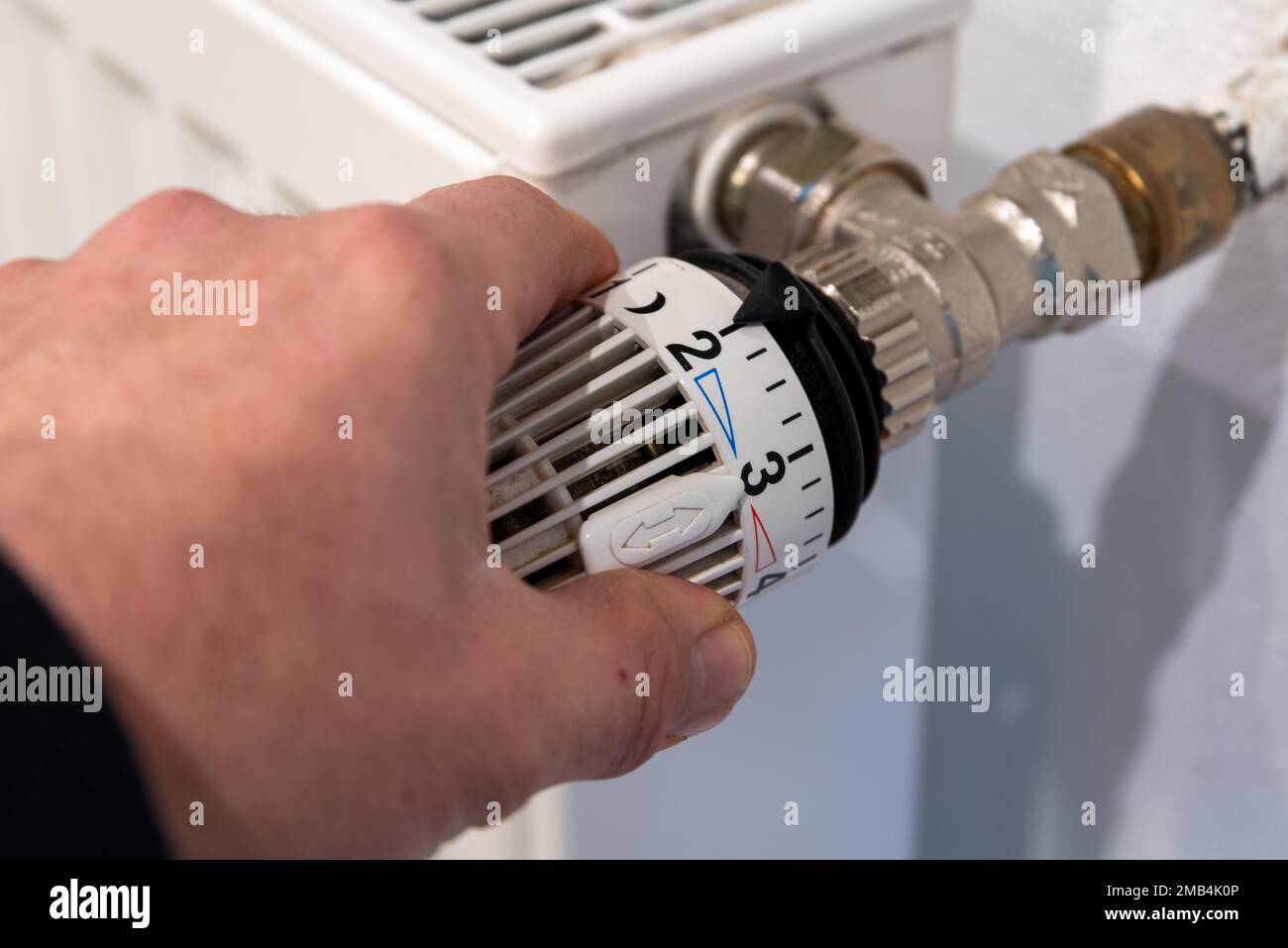 Turning down a radiator thermostat hi-res stock photography and images ...