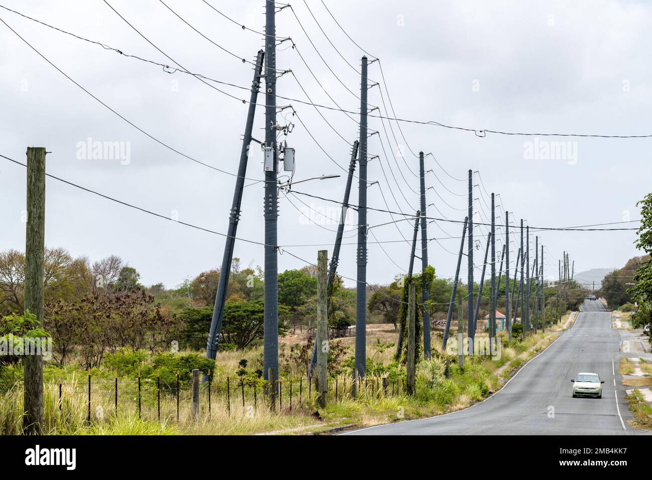 Composite power poles line the landscape in June 2022 on Midland Road ...