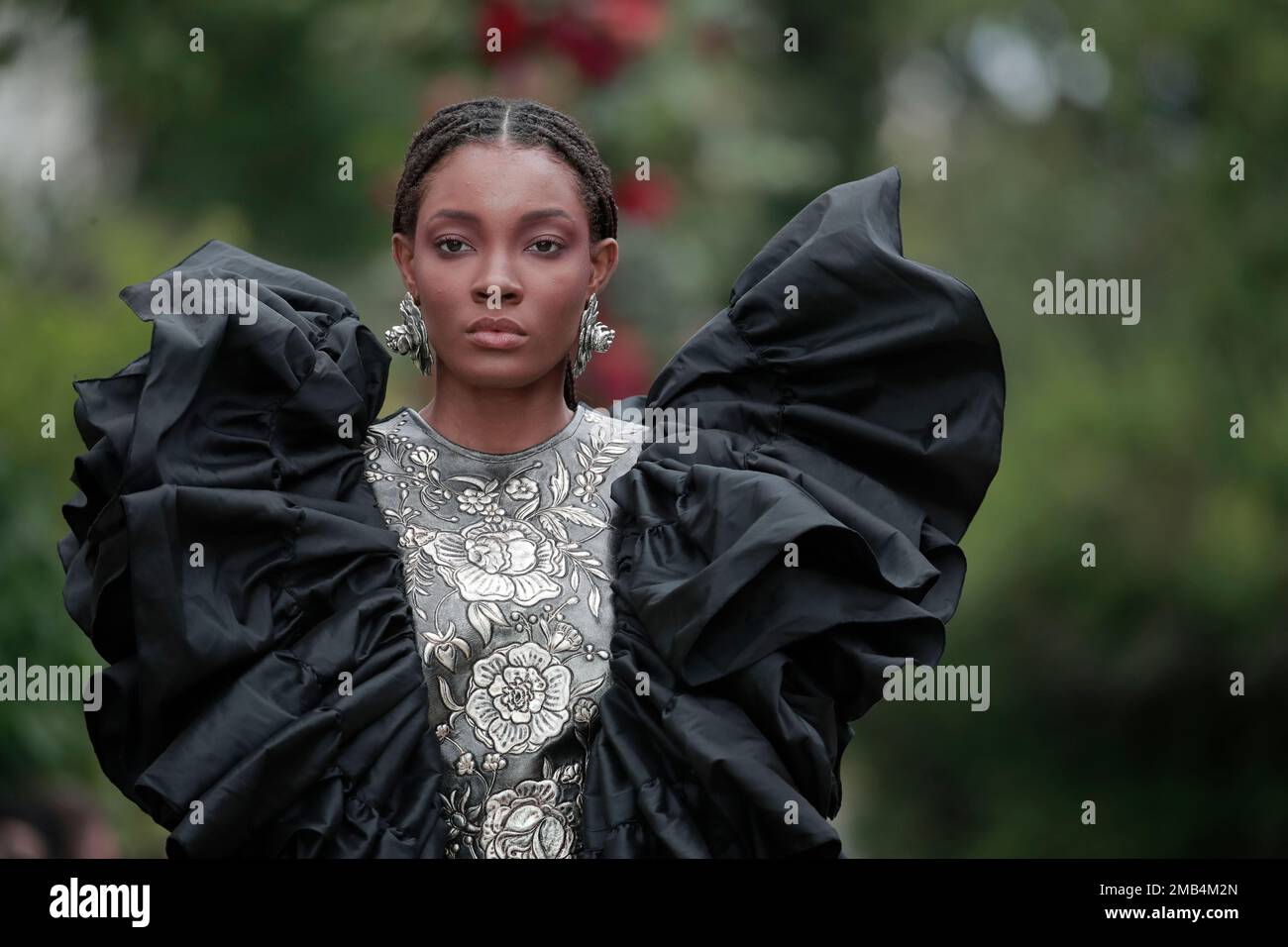 A model wears a creation as part of Juana Martin's Haute Couture Fall ...