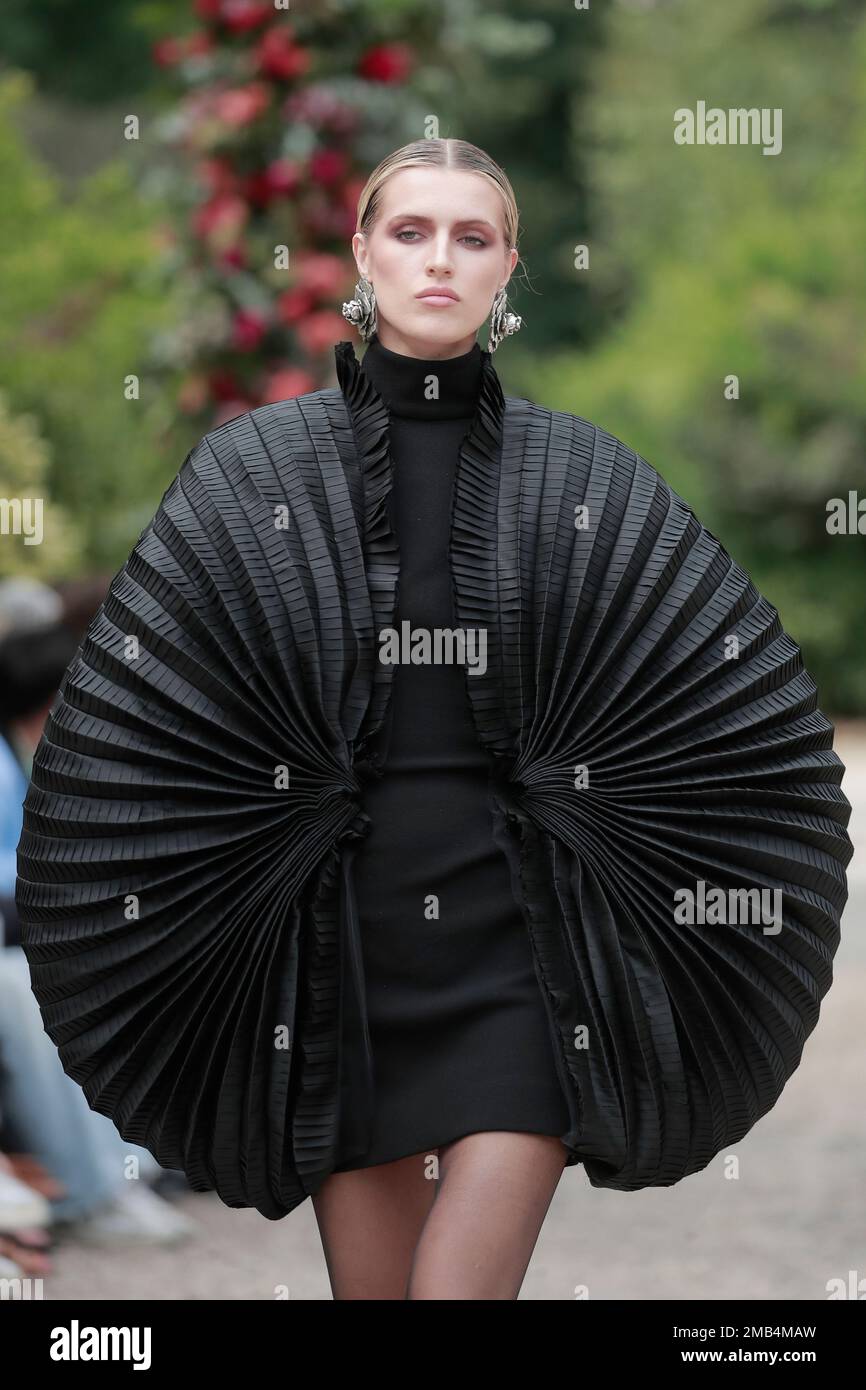 A model wears a creation as part of Juana Martin's Haute Couture Fall ...