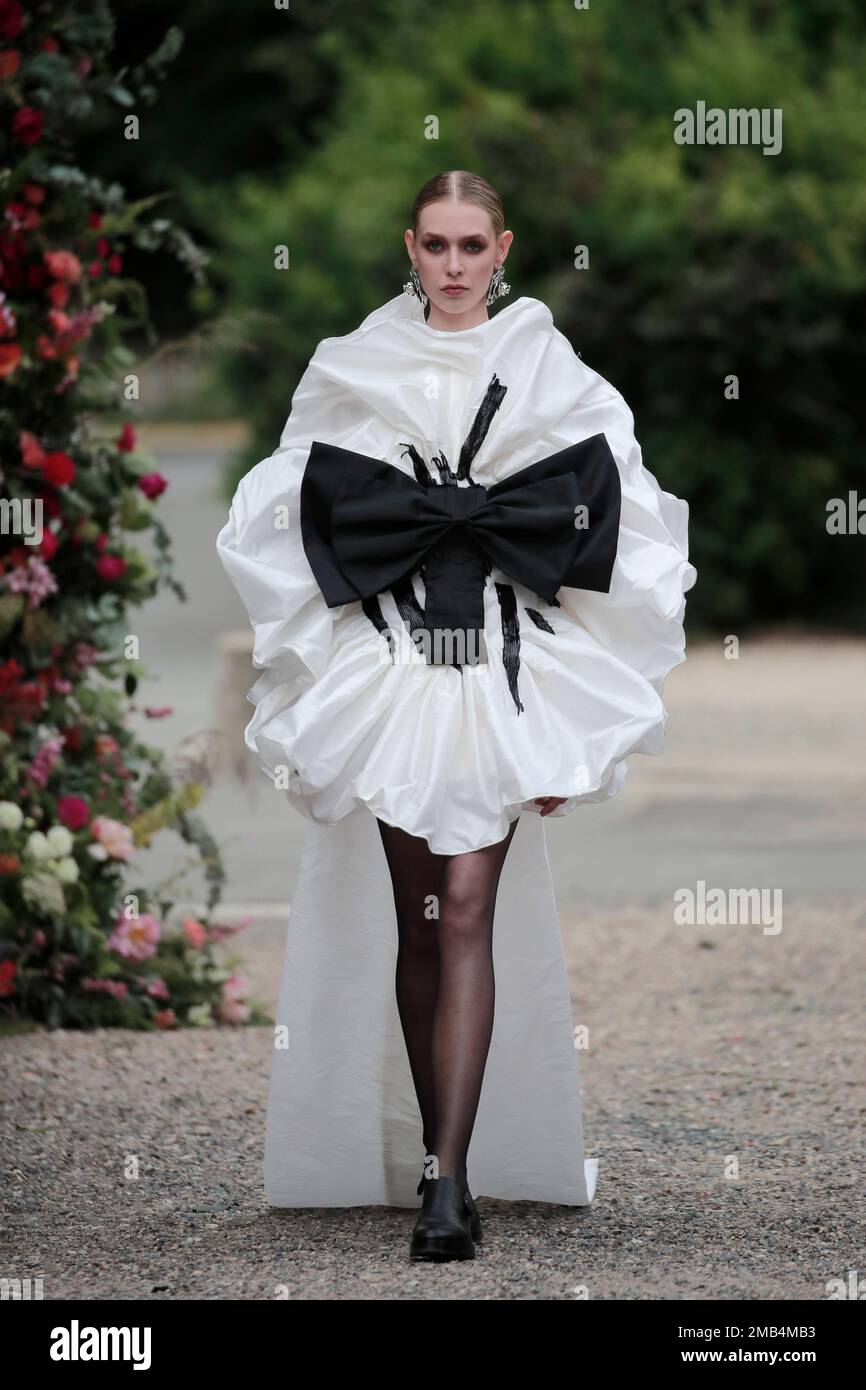 A model wears a creation as part of Juana Martin's Haute Couture Fall ...