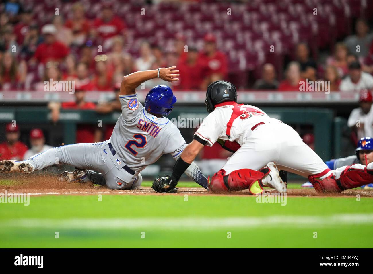 Cincinnati Reds catcher Aramis Garcia, right, attempts to tag New York ...