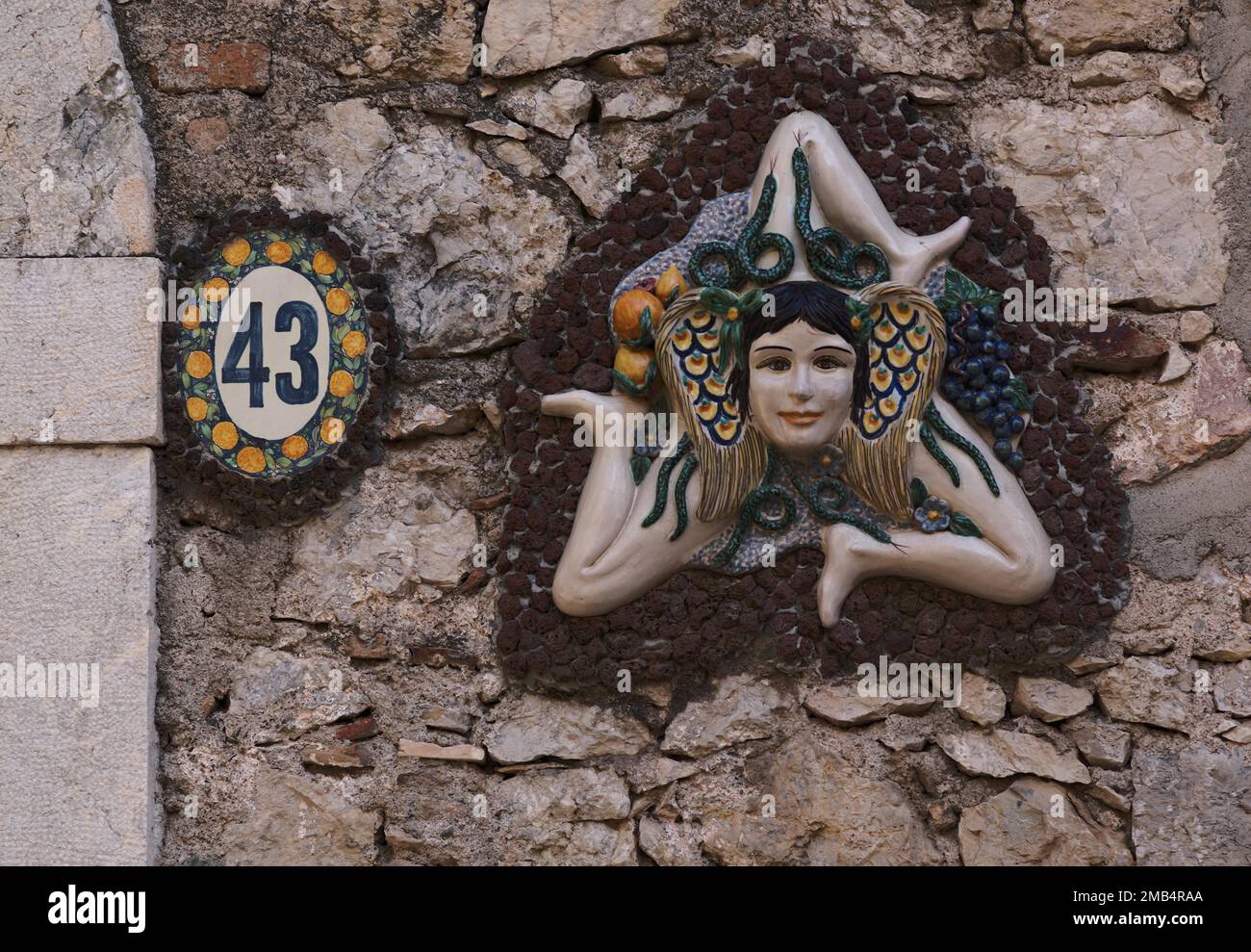 Trinacria on a wall, symbol for Sicily, ceramics, Taormina, Sicily ...