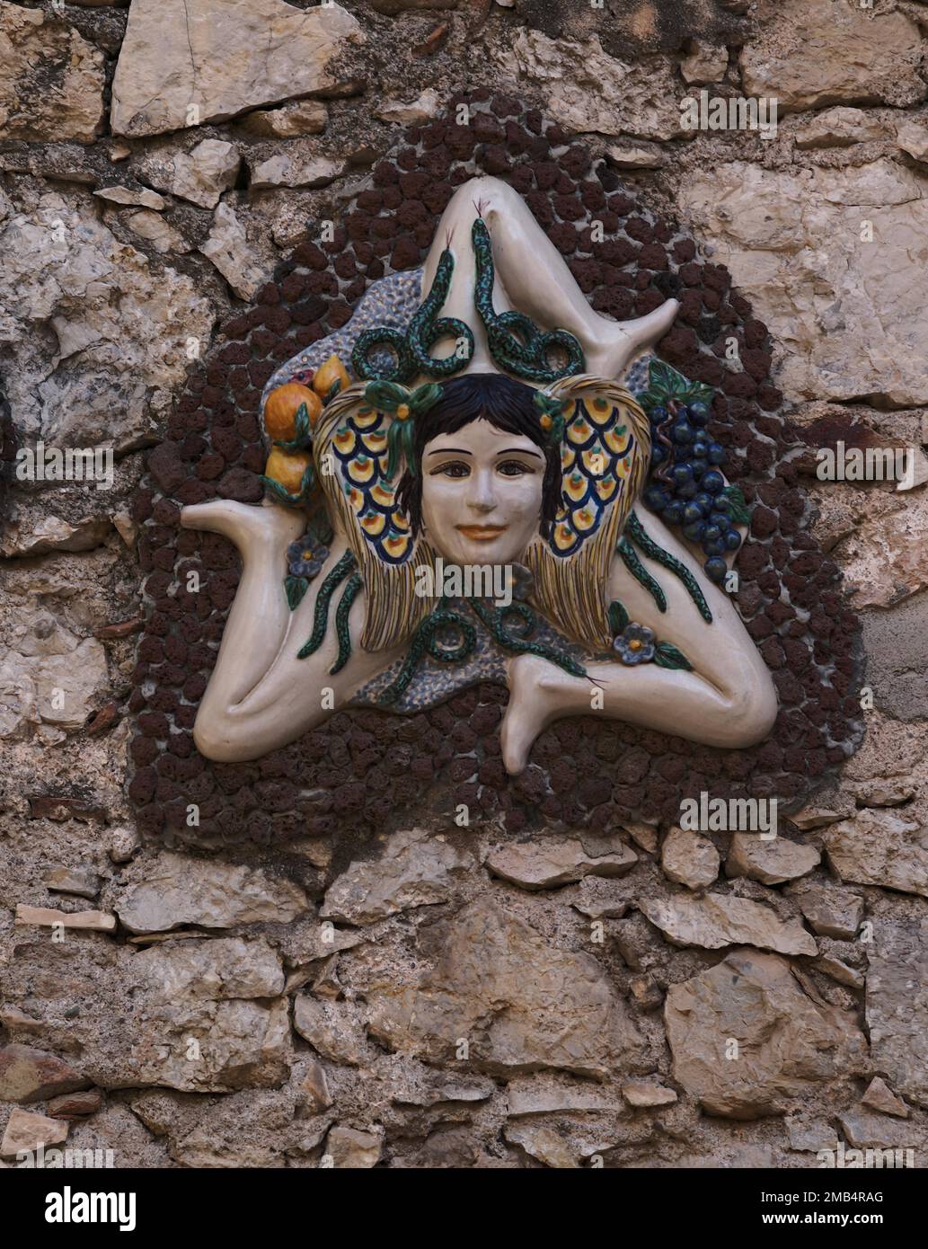 Trinacria on a wall, symbol for Sicily, ceramics, Taormina, Sicily ...