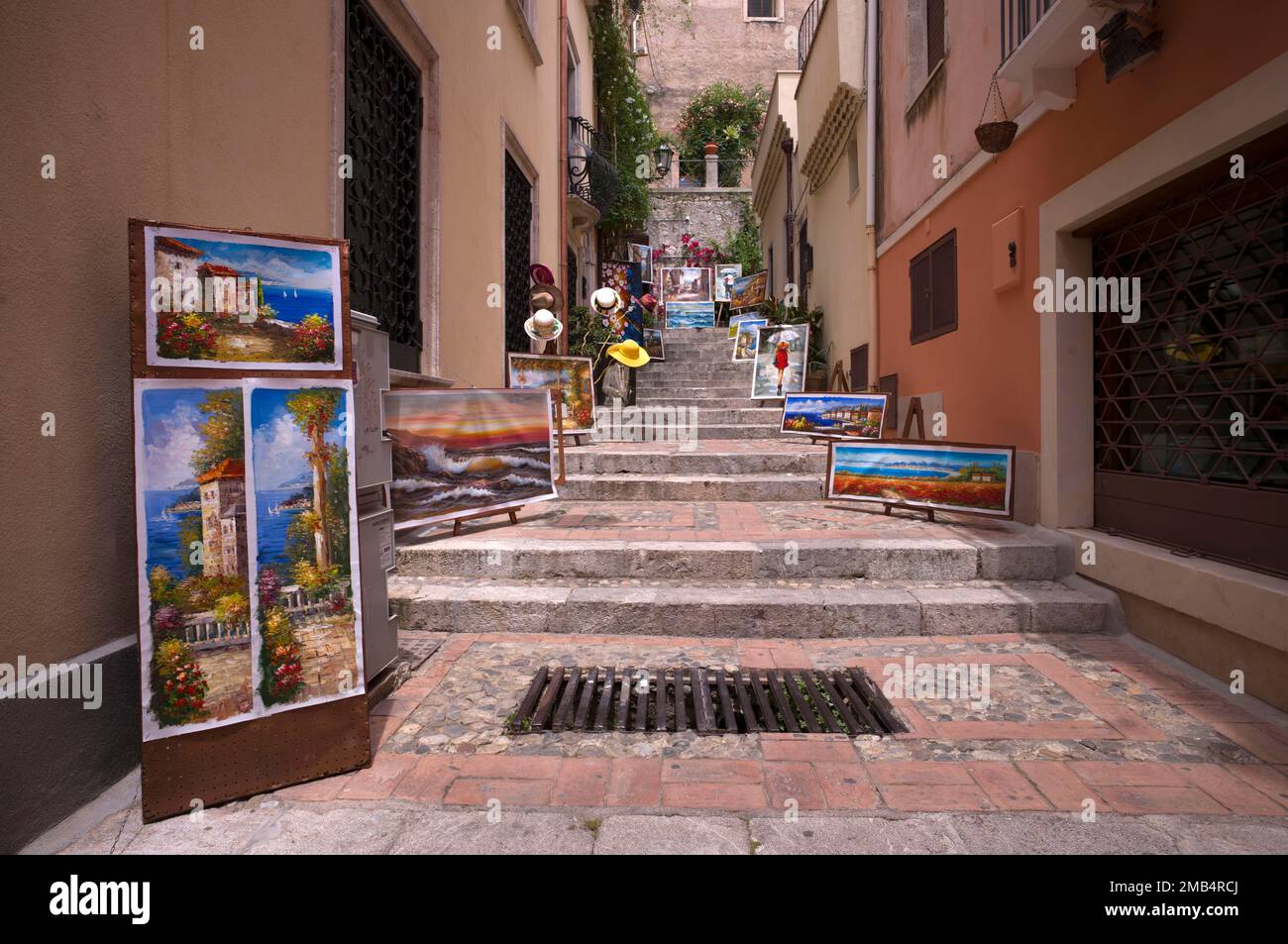 Display, works of an art gallery in an alley, Taormina, Sicily, Italy ...
