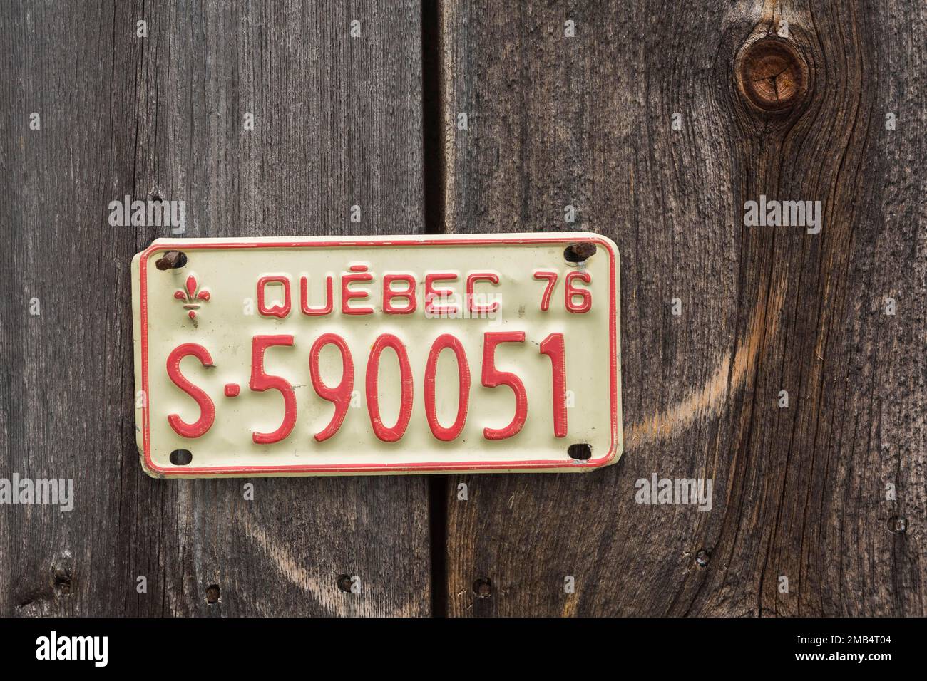 Vintage 1976 Quebec province license plate displayed on side wall of ...