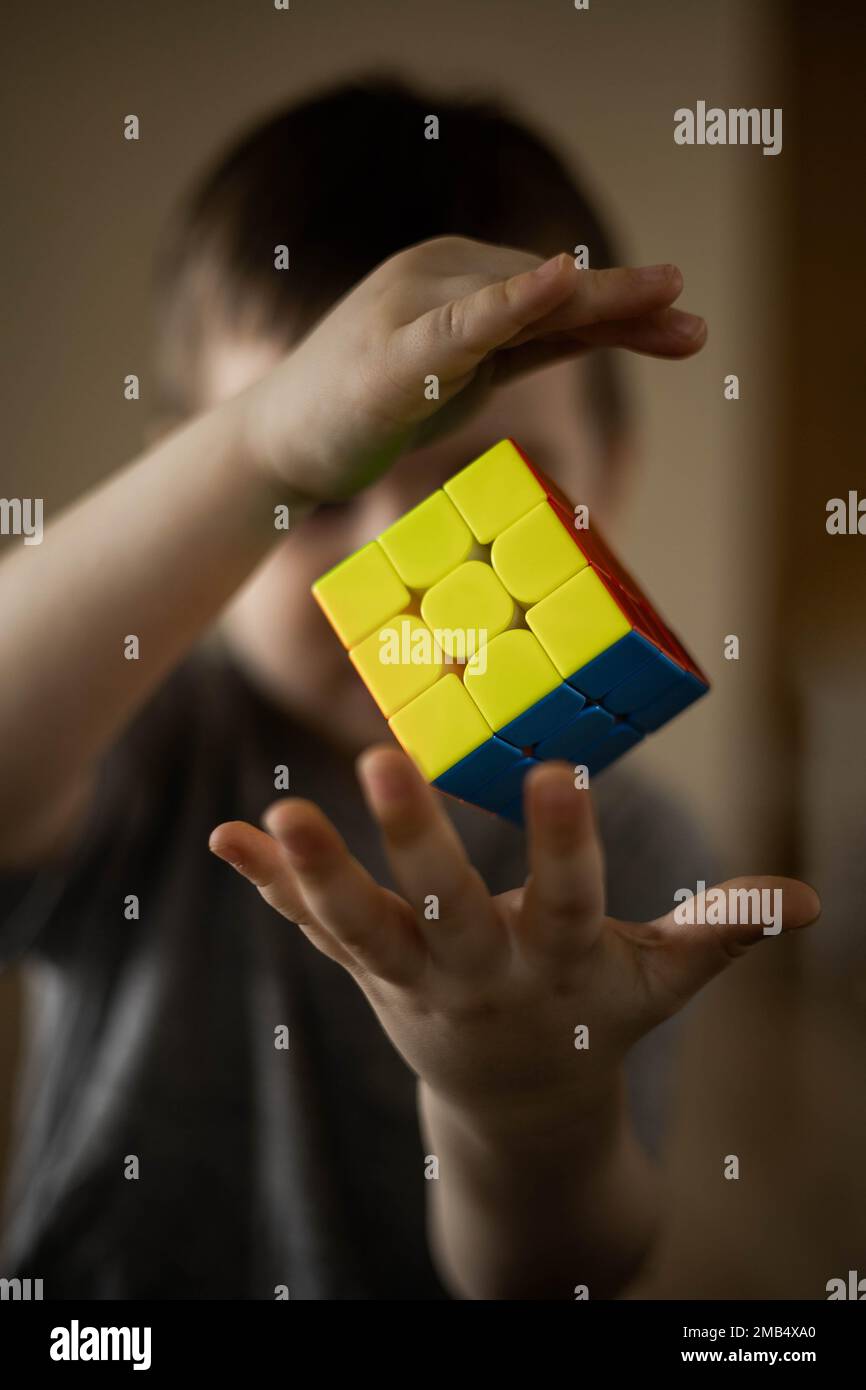 Khabarovsk, Russia, February 27, 2022. Cute baby boy holding twisted ...
