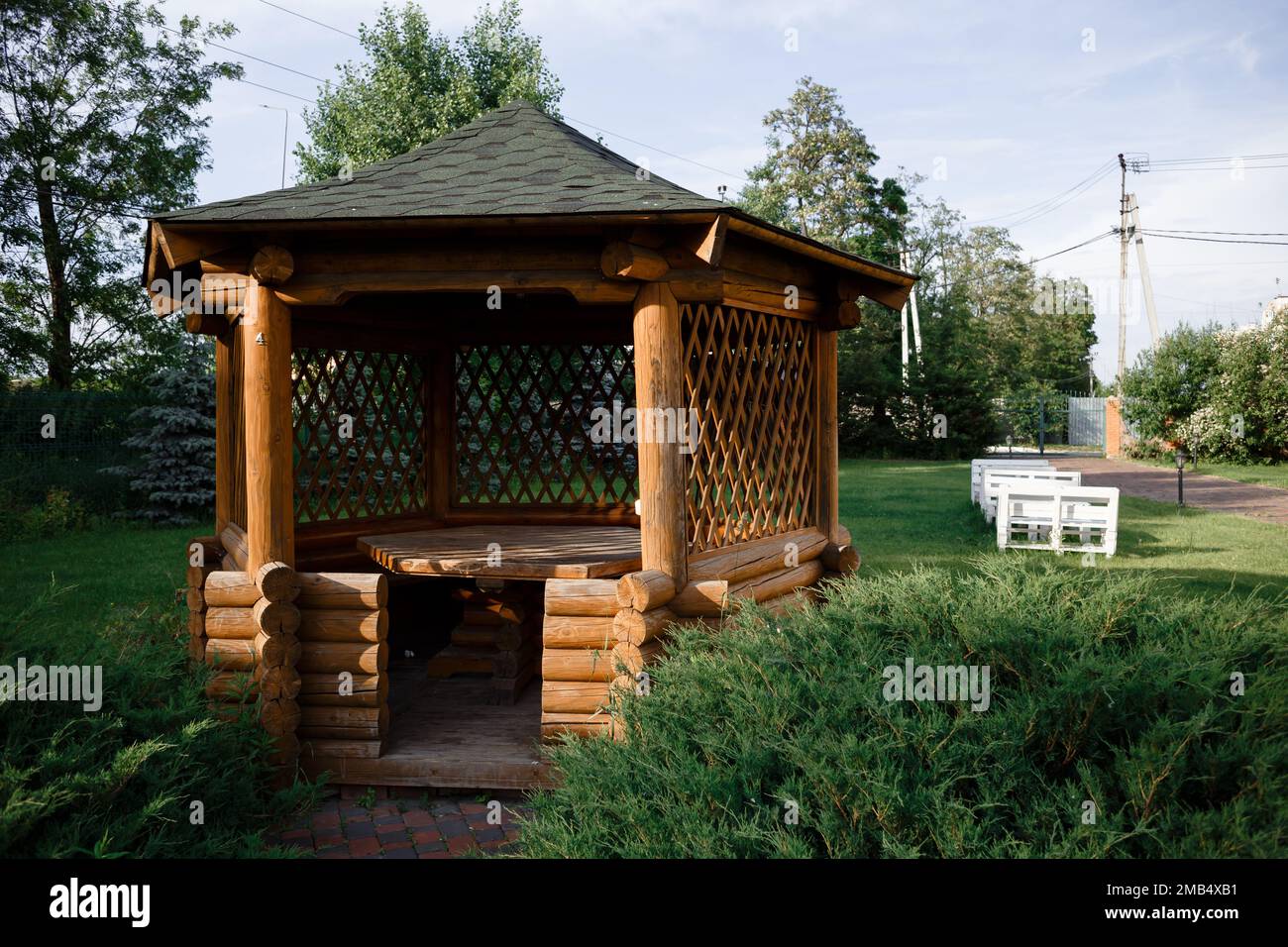 Camping gazebo with barbecue table and bench for outdoor picnic in ...