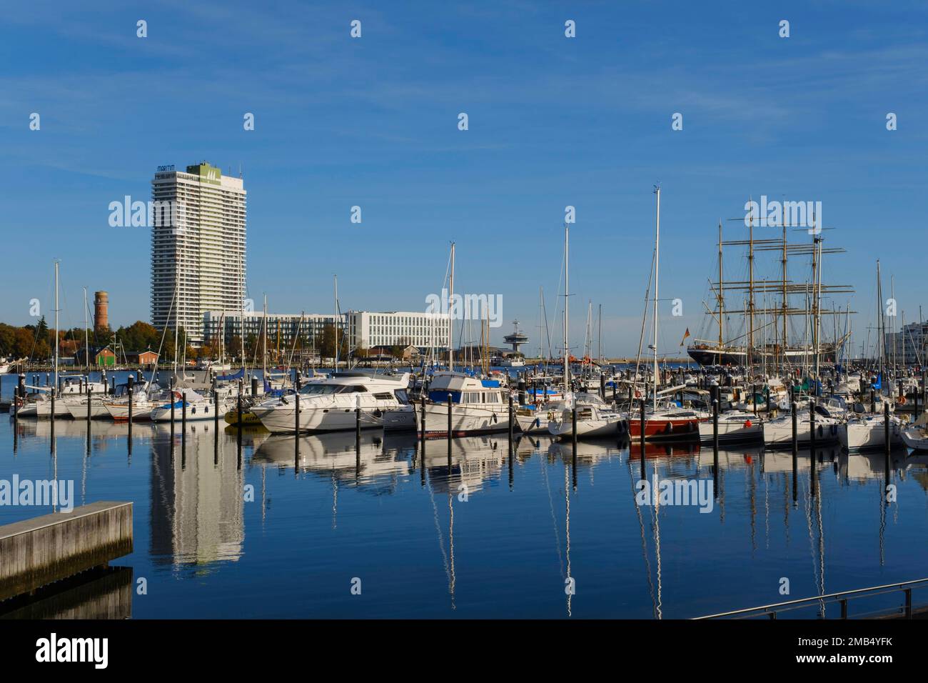 Old lighthouse, Hotel Maritim, marina with sailing ship Passat, Priwall ...