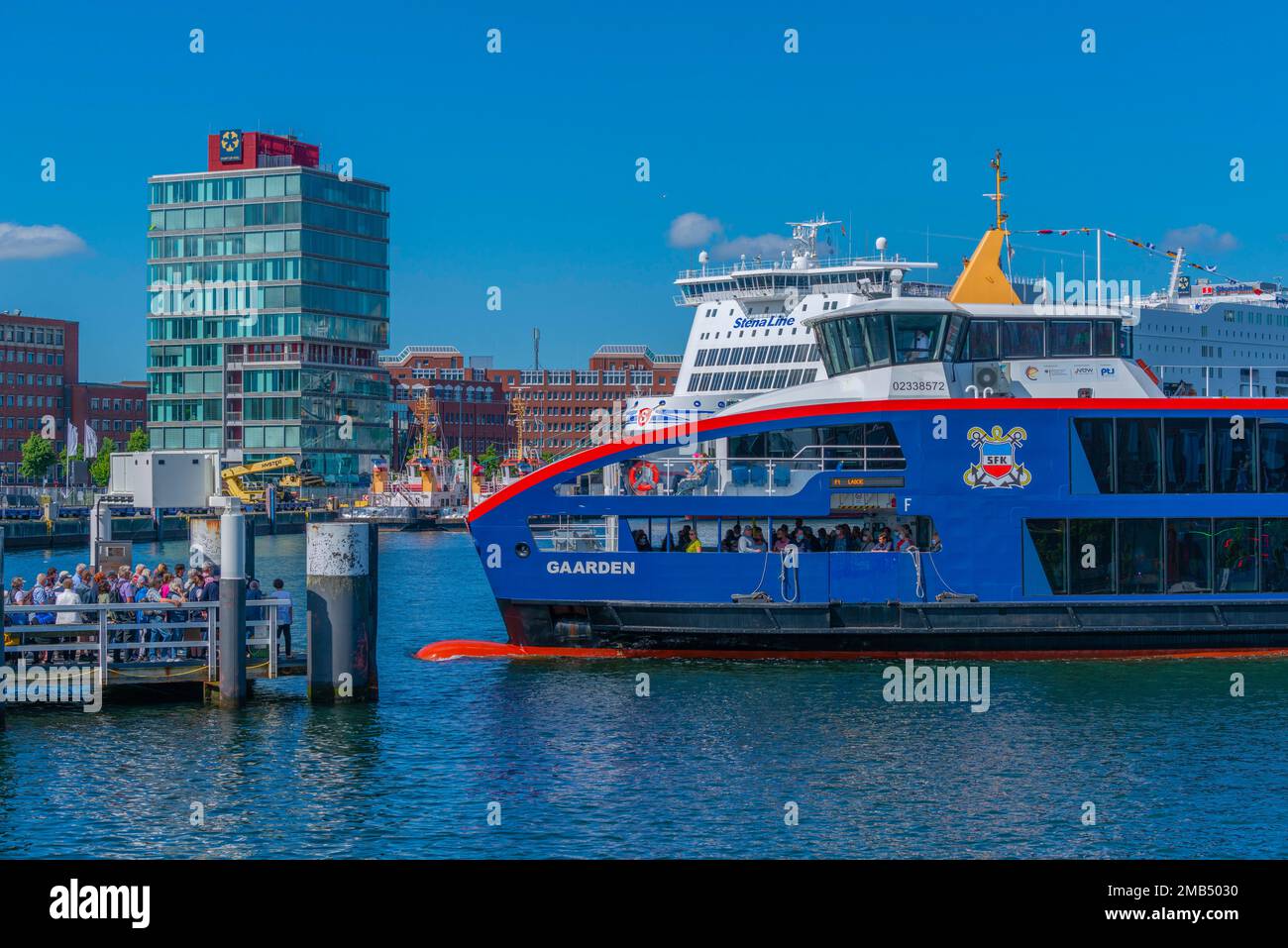 Liner, ferry in front of pier, high-rise building, Kieler Woche 2022 ...