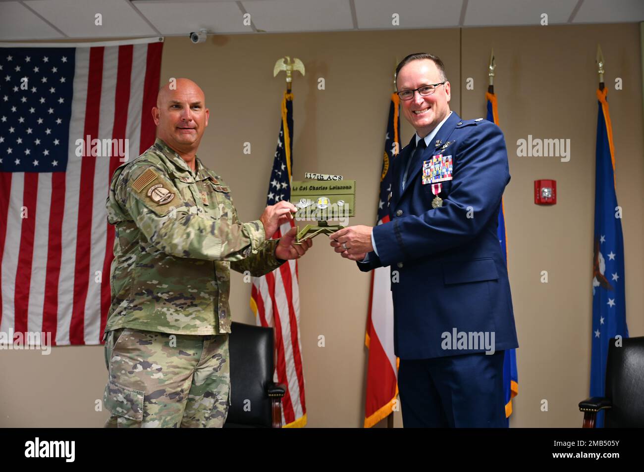 U.S. Air Force Lt. Col. Charles Loiacono was presented a gift during ...