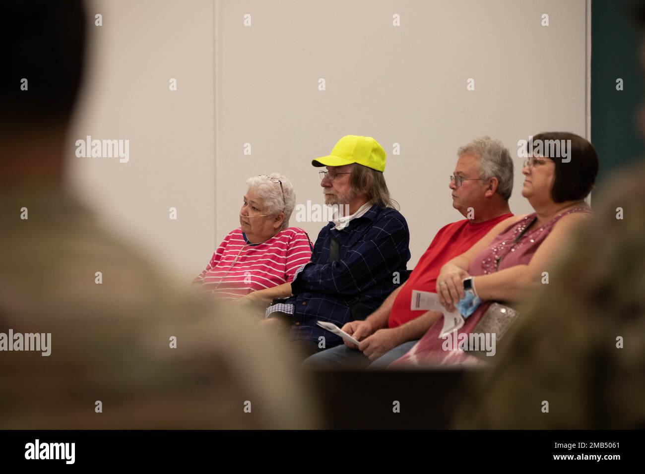 The family of U.S. Army Reserve Lt. Col. Jennifer Mack sit in support ...