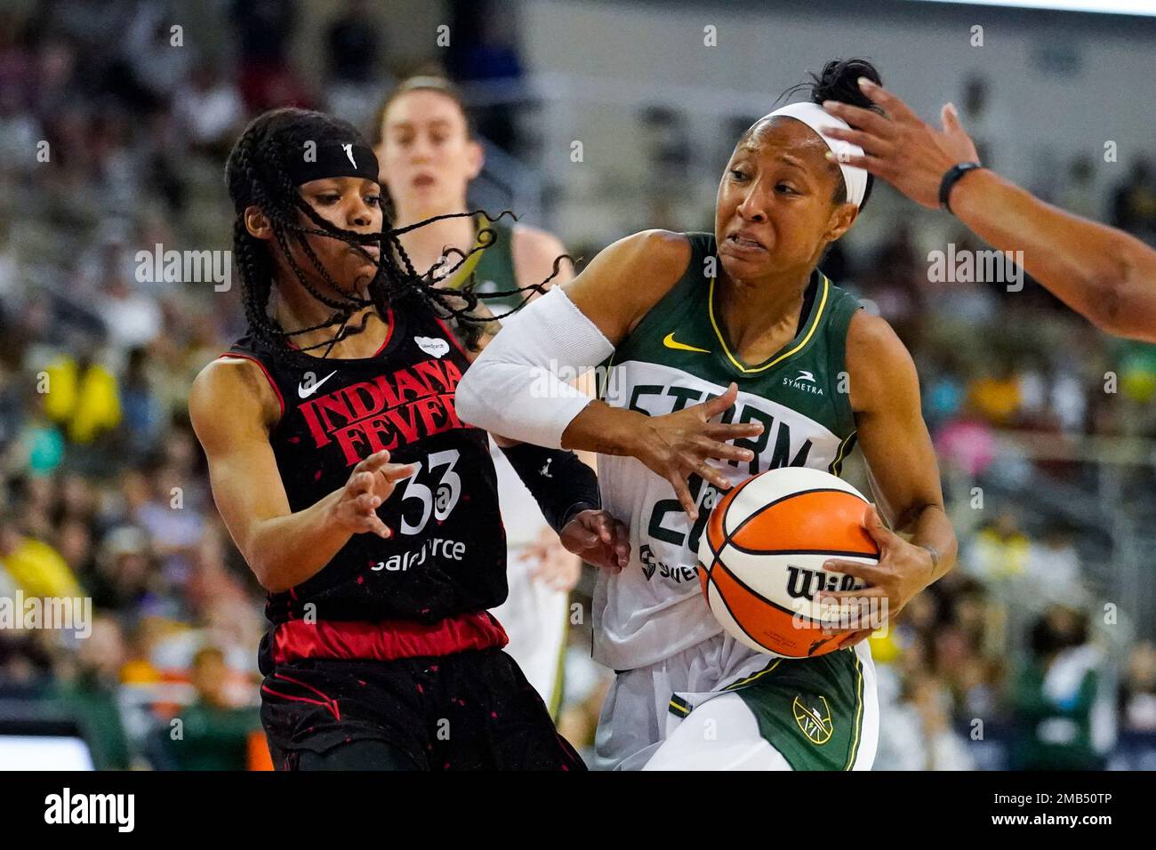 Seattle Storm center Mercedes Russell (21) drive son Indiana Fever ...