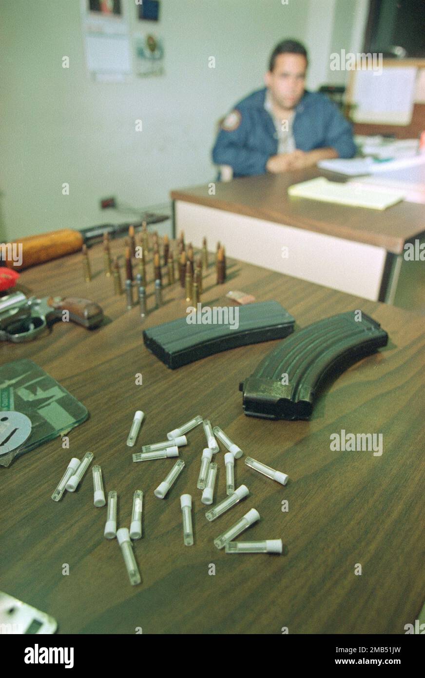 Vials of crack cocaine, AK47s and clips, revolvers and glock pistols ...