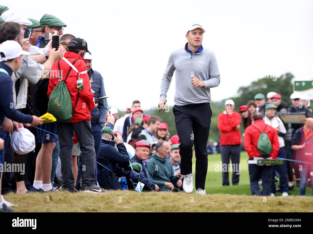 U.S golfer Jordan Spieth runs to the 9th tee box during the JP McManus ...