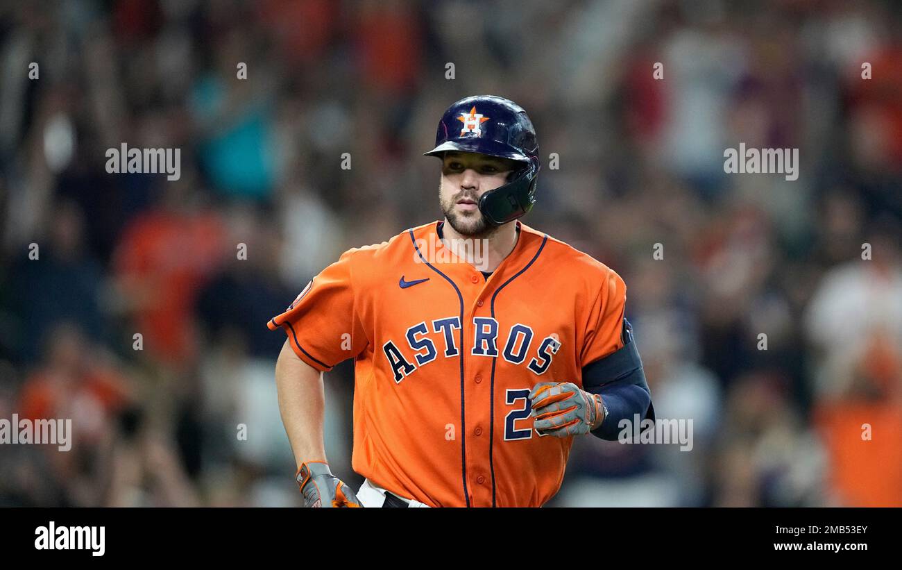 Houston Astros' Chas McCormick runs up the first base line after ...