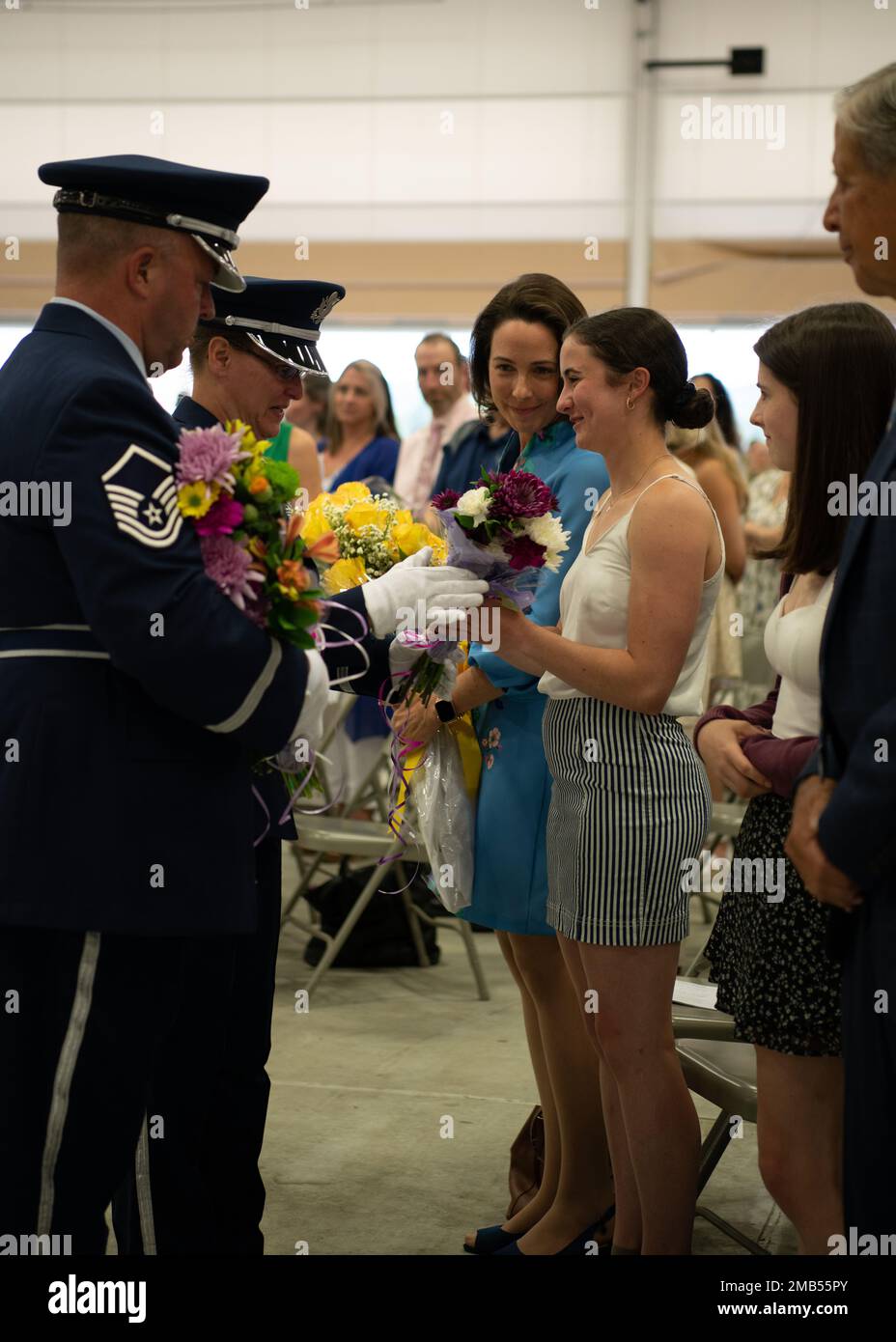 104th Fighter Wing honor guard members bring forward bouquets of ...