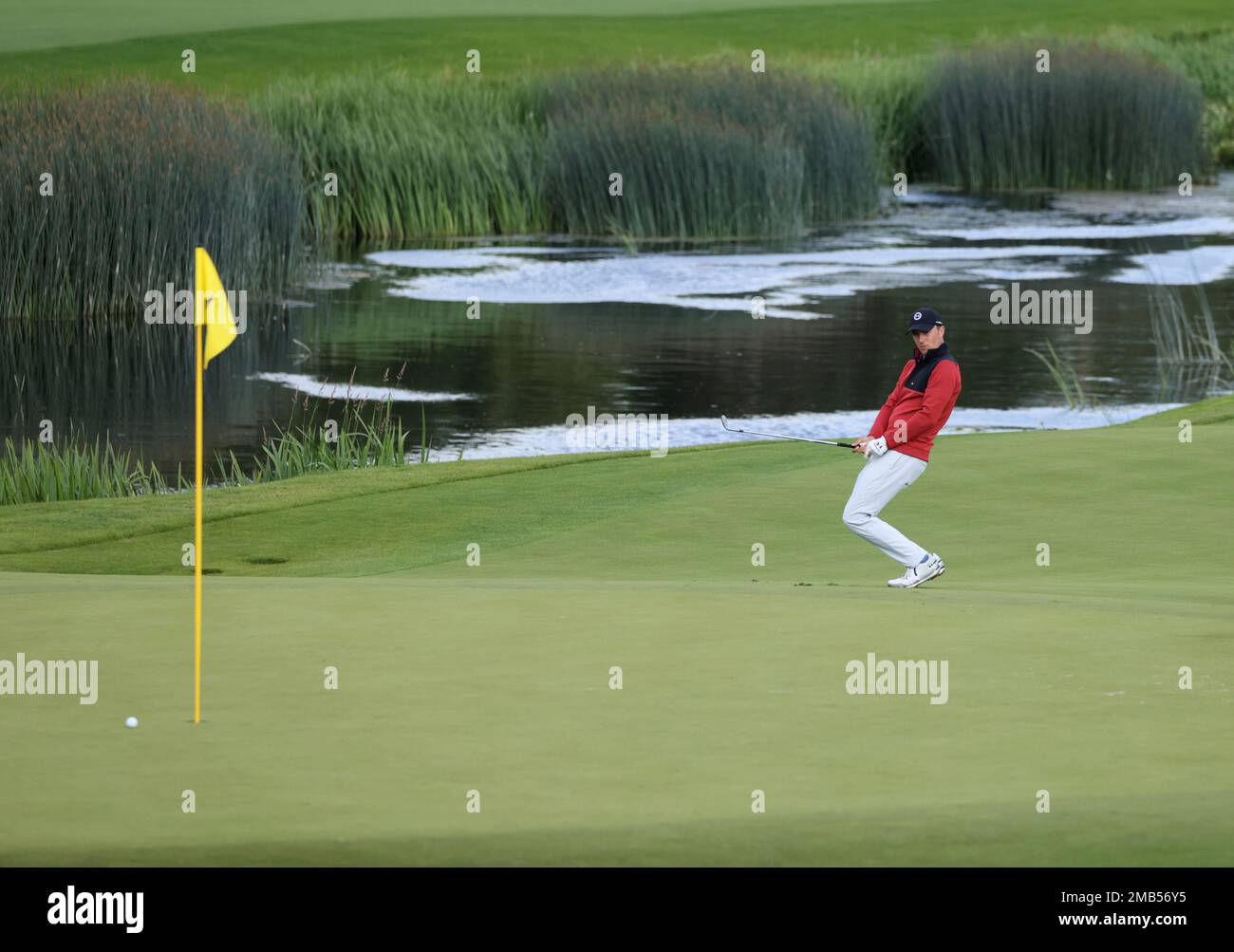 U.S golfer Jordan Spieth reacts after missing a putt on the 18th green ...
