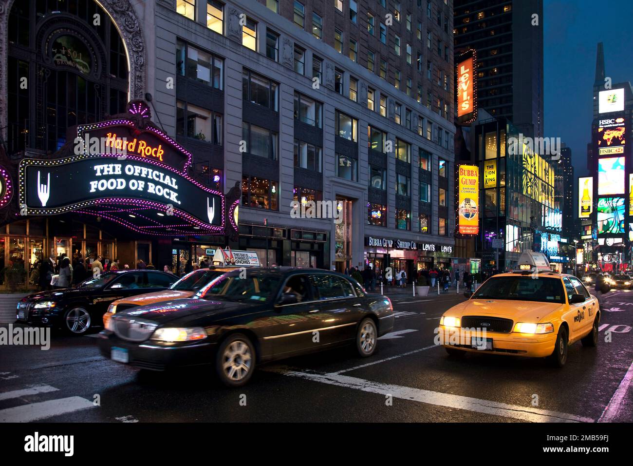 Night view of Times Square traffic and neon signs, New York Stock Photo ...