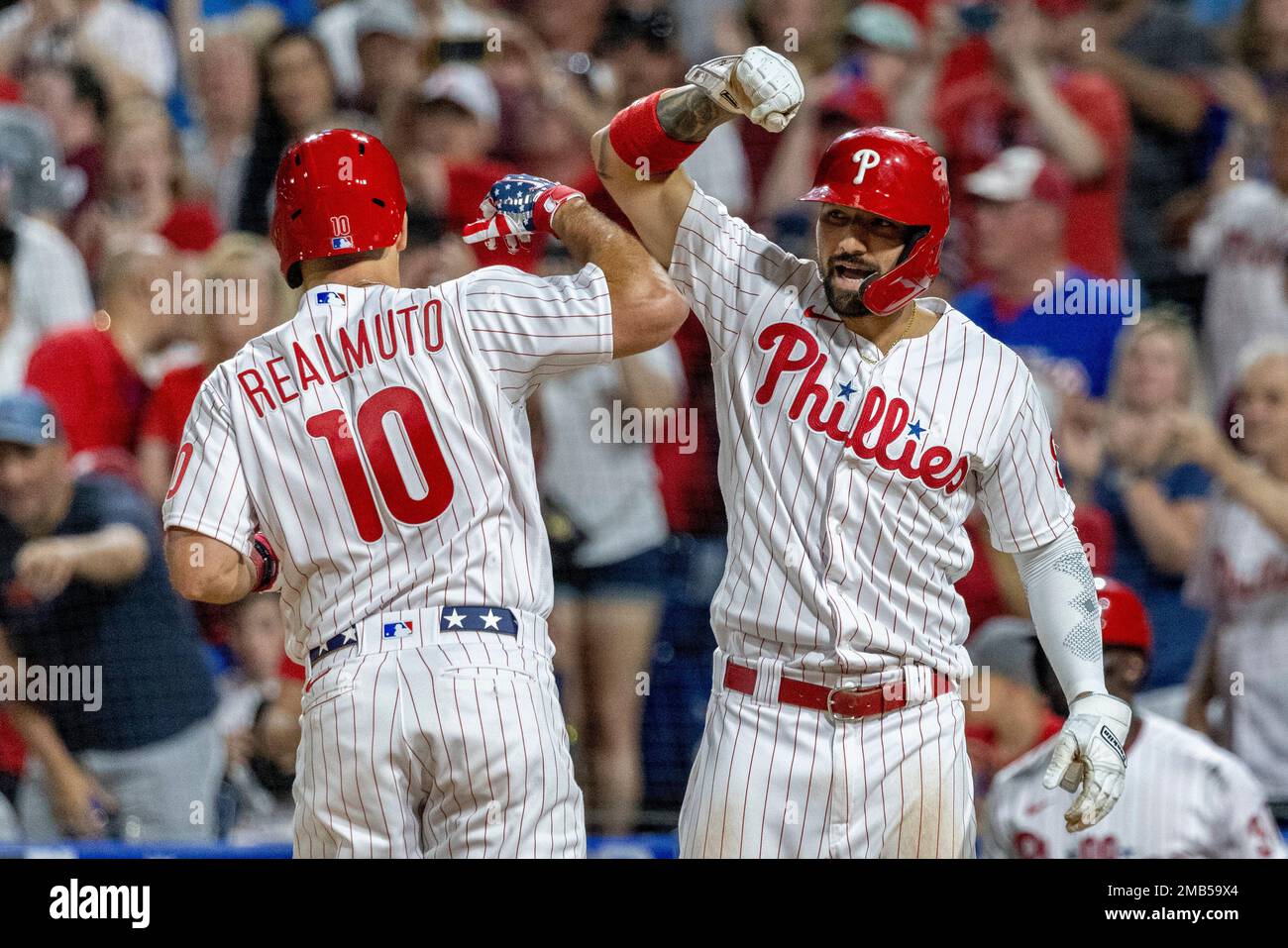 Philadelphia Phillies' Nick Castellanos, right, congratulates J.T ...
