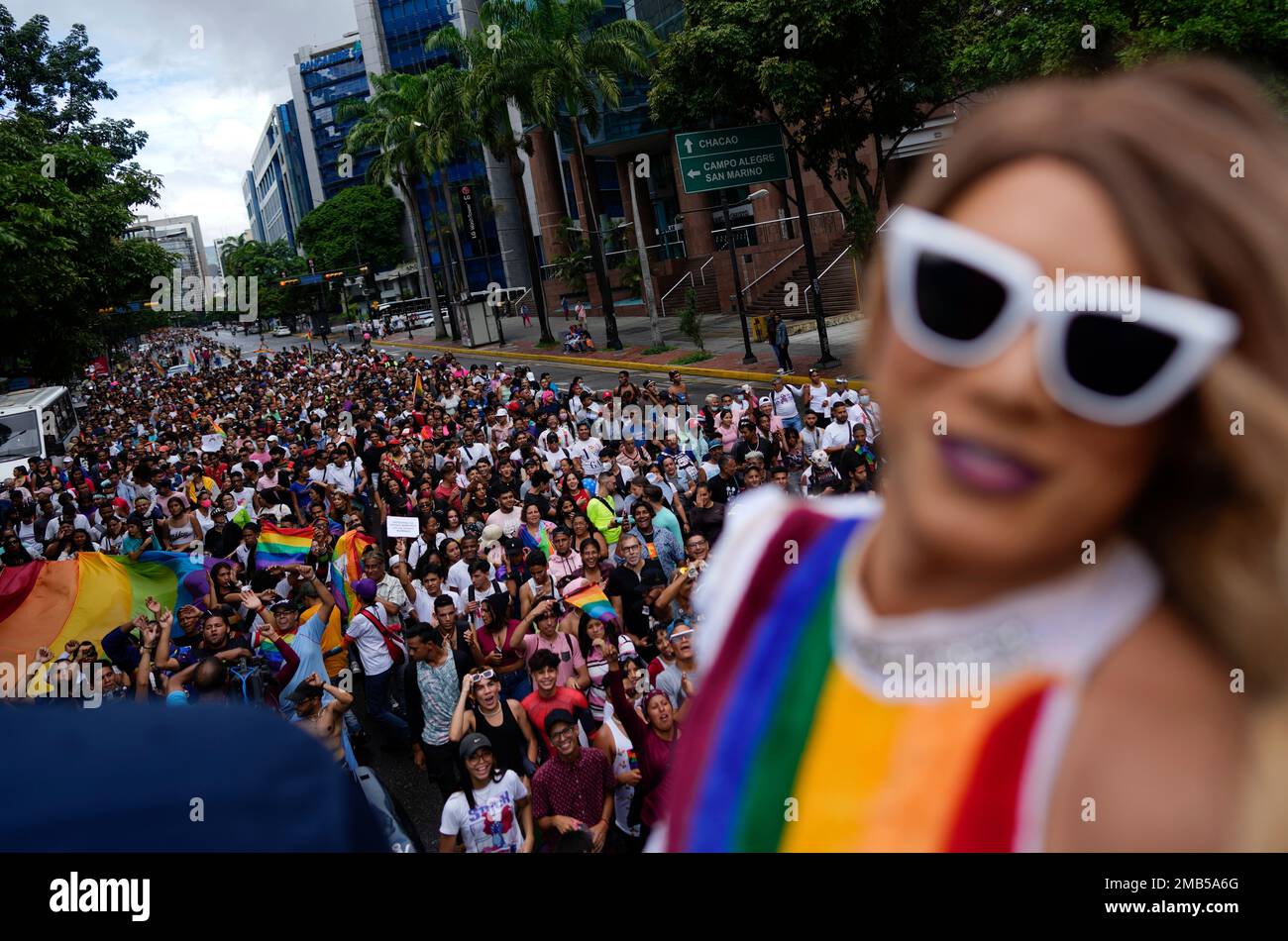 People participate in the Gay Pride parade in Caracas, Venezuela ...