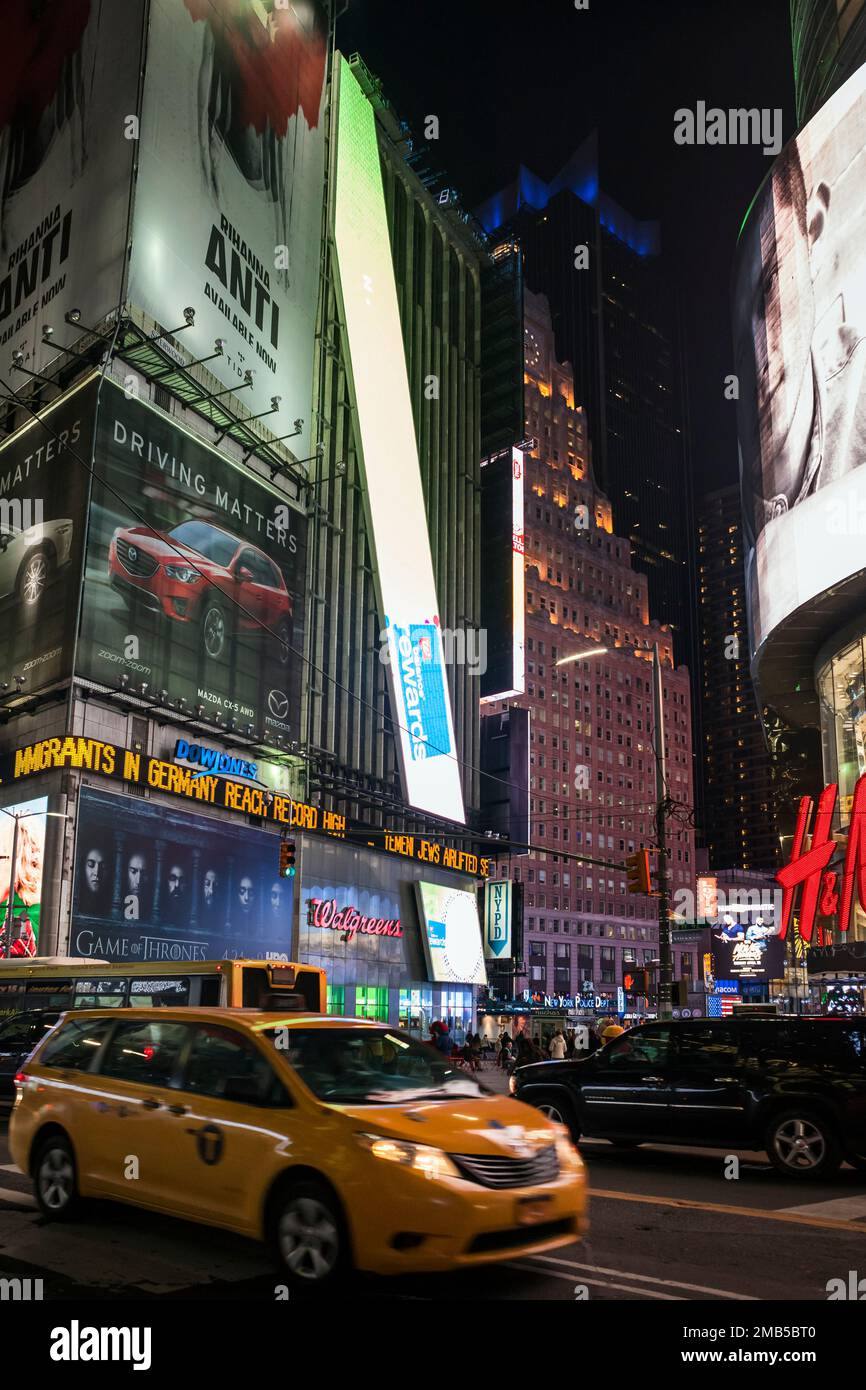 Night view of Times Square traffic and neon signs, New York Stock Photo ...