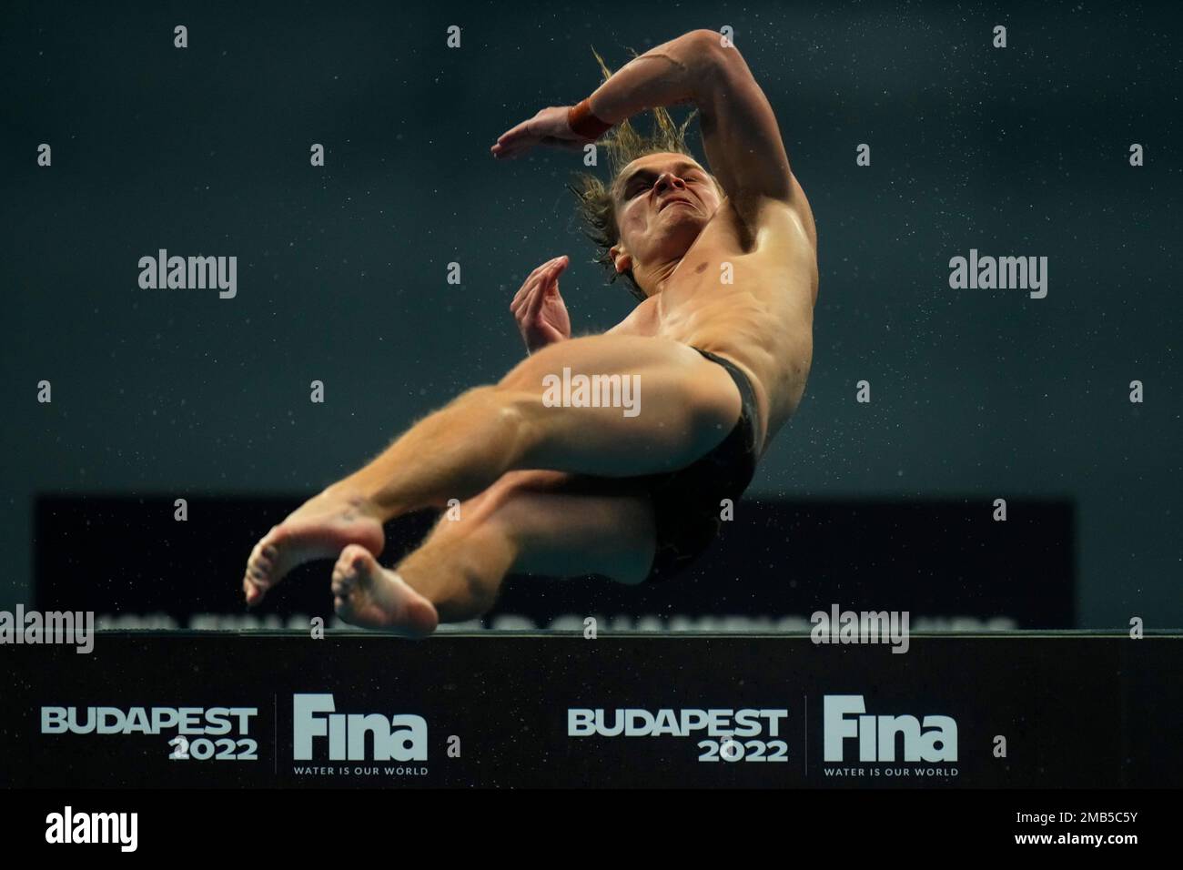 Cassiel Rousseau of Australia competes during the men's diving 10m ...