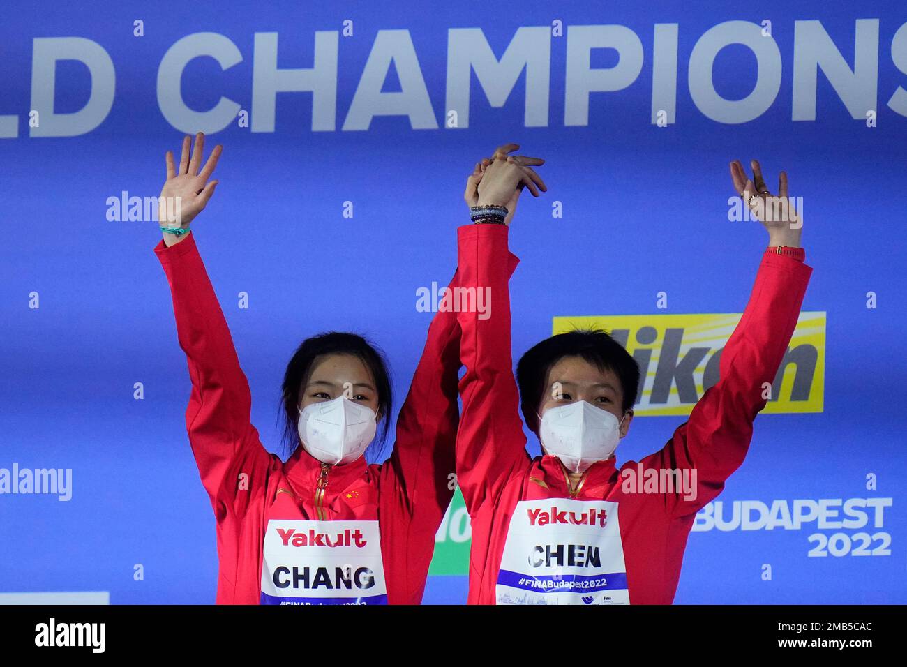 First placed Chang Yani and Chen Yiwen of China celebrate after the ...