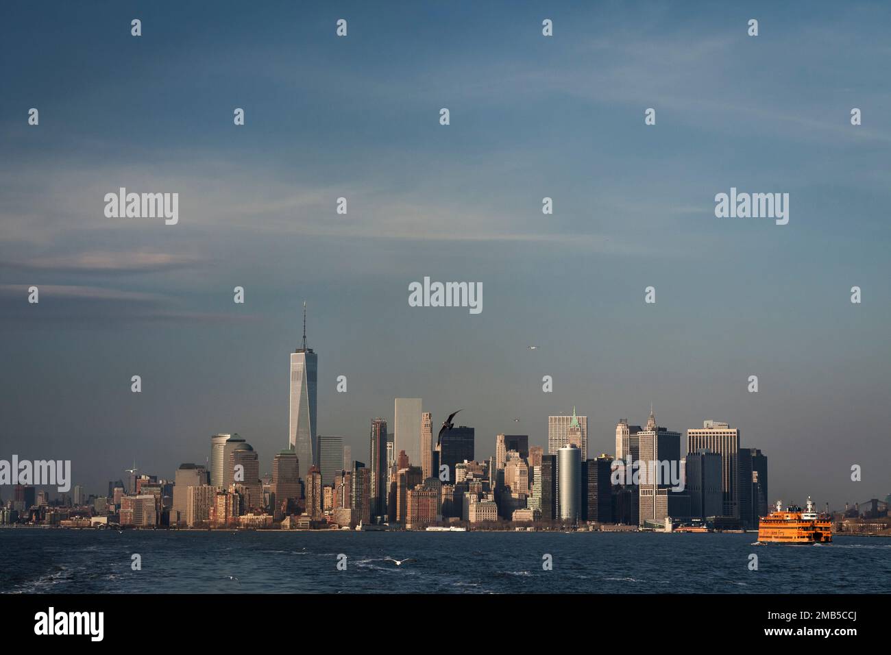 Lower Manhattan skyline at sunset from New York Bay Stock Photo - Alamy