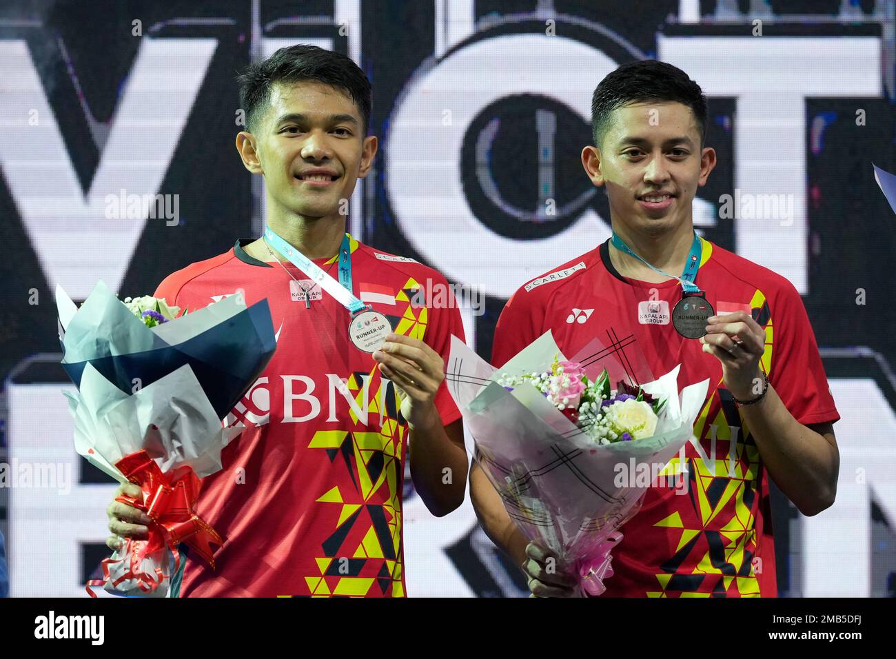 Men's doubles runners up Indonesia's Fajar Alfian, left, and Muhammad ...