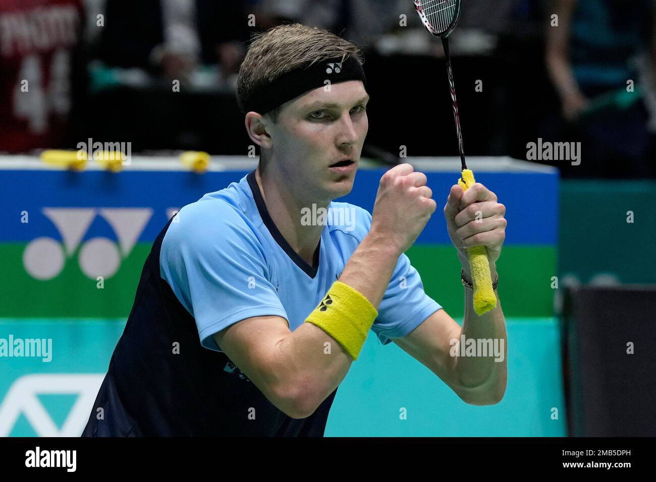 Viktor Axelsen of Denmark celebrates after defeating Kento Momota of ...
