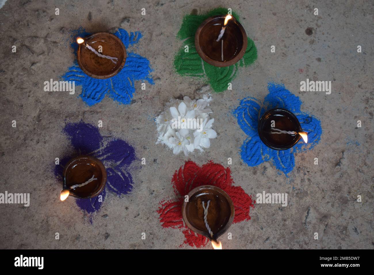 Rangoli Diwali lamp decoration Stock Photo - Alamy