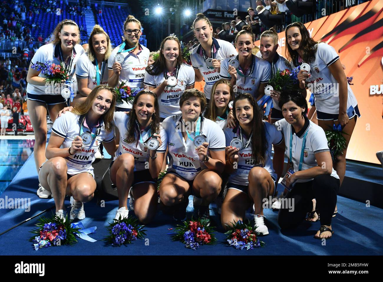 Members of Hungary women water polo team pose with their silver medals ...