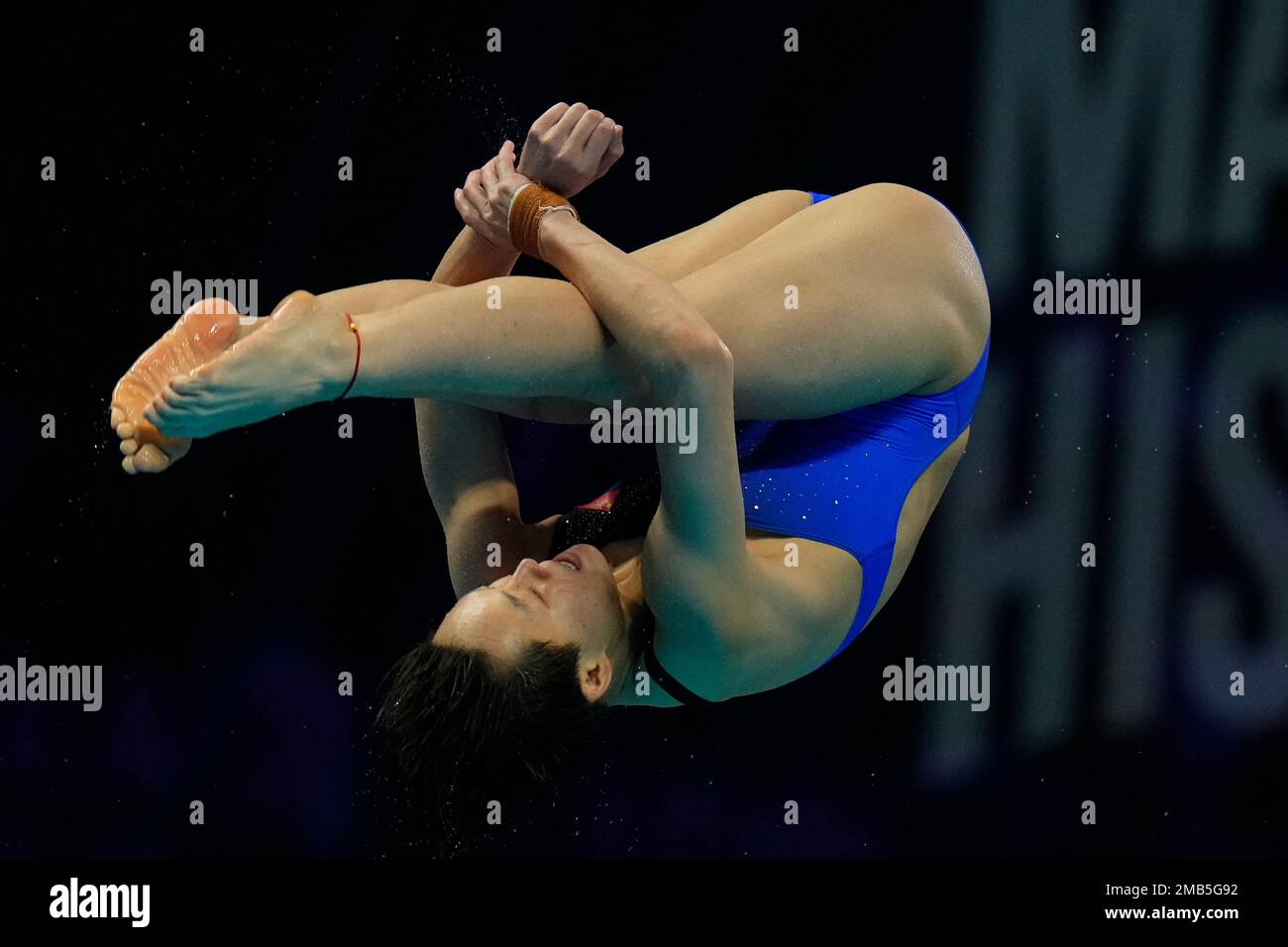 Chen Yiwen of China competes during the women's diving 3m springboard ...