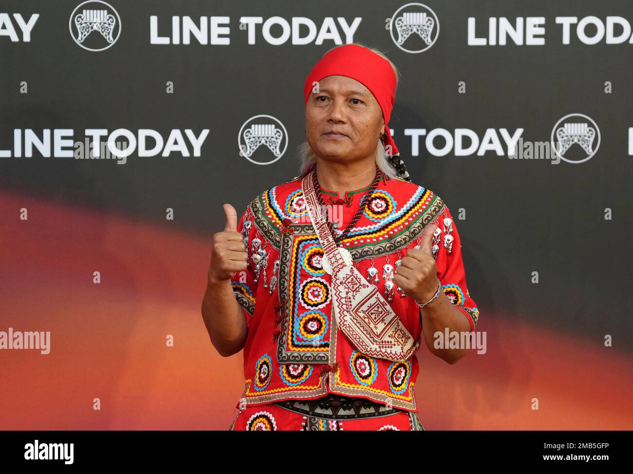 A Von, a member of Taiwanese vocal group New Formosa Band pose for a ...