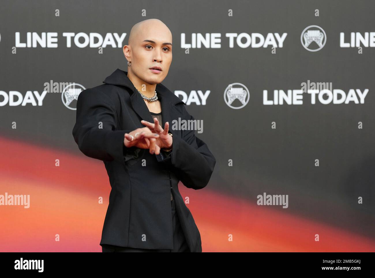 Taiwanese singer Yellow poses for a photo as he arrives for the 33rd ...