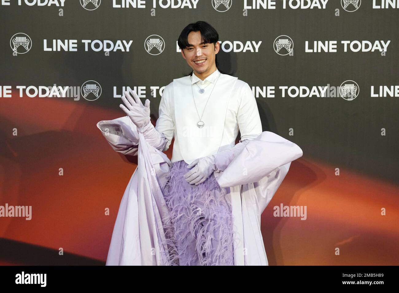 Taiwanese composer HUSH poses for a photo as he arrives for the 33rd ...