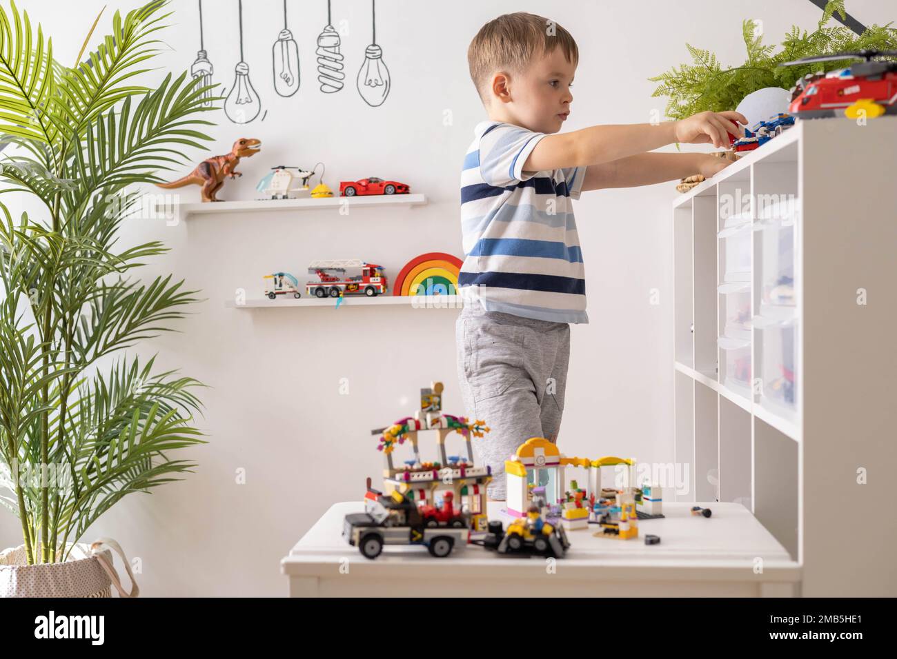 Khabarovsk, Russia, August 05, 2022. Male kid constructing toy ...