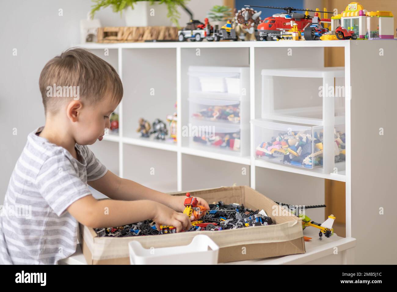 Boy playing with lego top view hi-res stock photography and images - Alamy