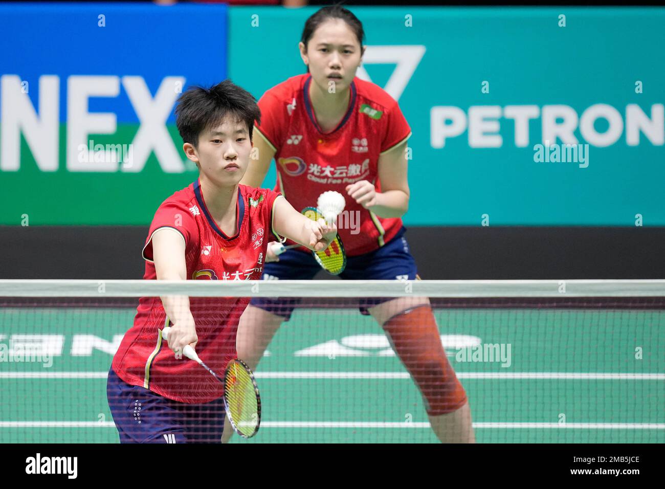 China's Zheng Yu, left, and her teammate Zhang Shu Xian play against ...