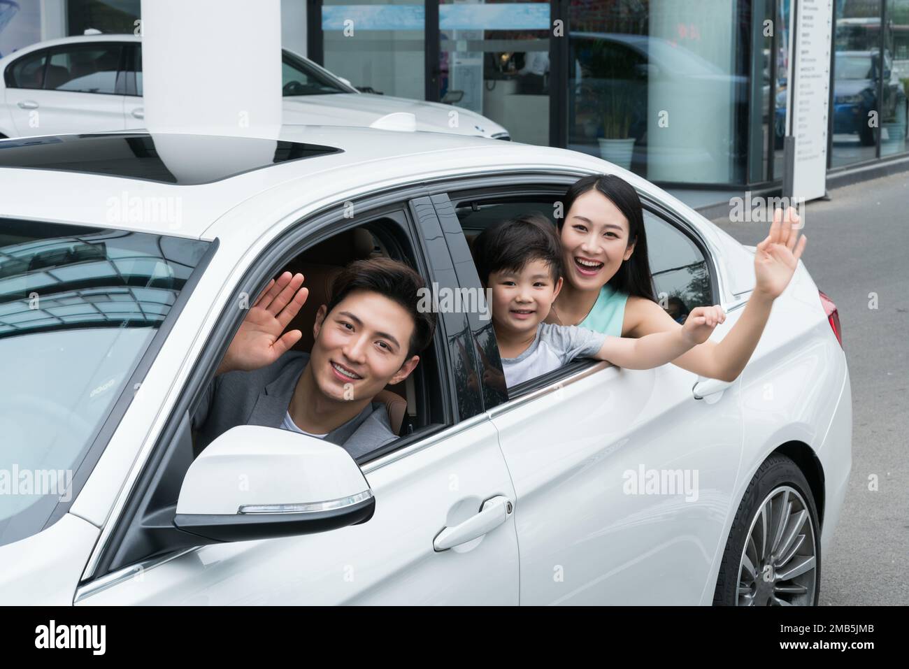 Three of choose and buy cars Stock Photo - Alamy