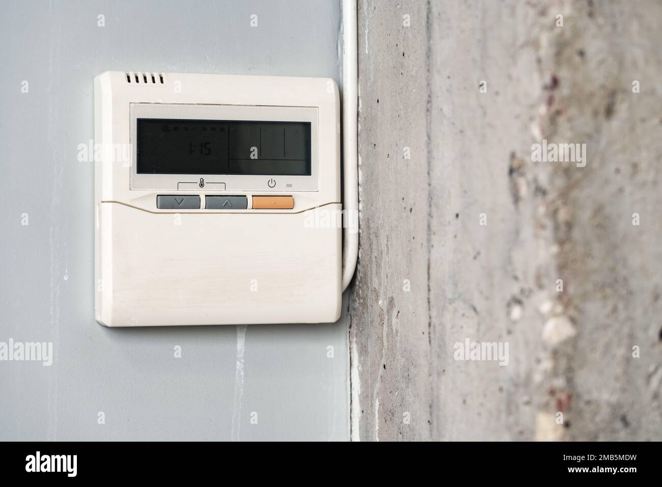 Home security alarm system remote control on the wall Stock Photo - Alamy