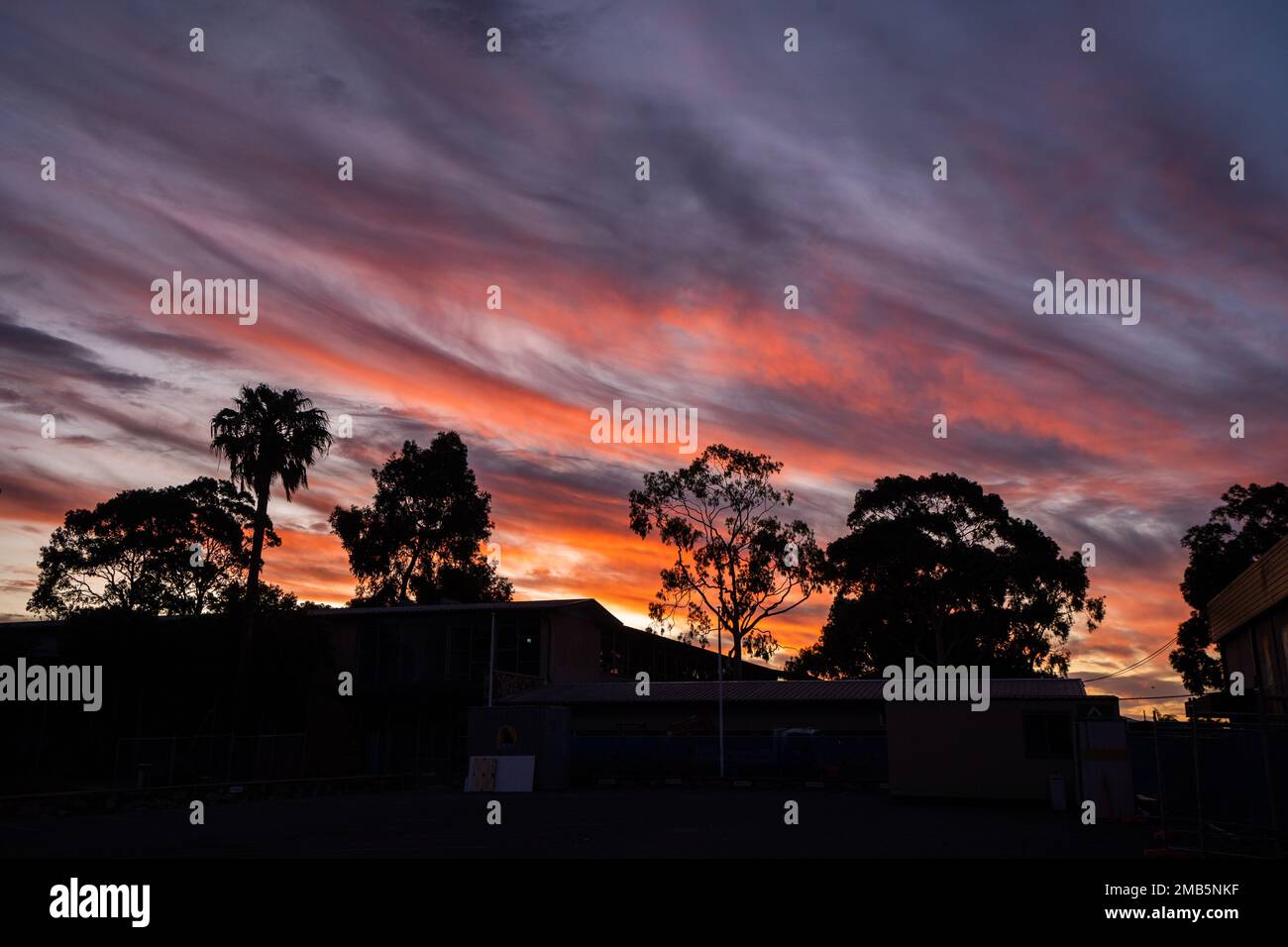 Firesky sunset with orange and red coloured clouds Stock Photo - Alamy