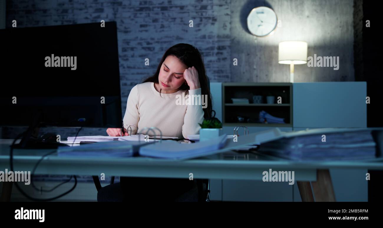 Stressed Tax Advisor With Headache. Sad Accountant Stock Photo - Alamy