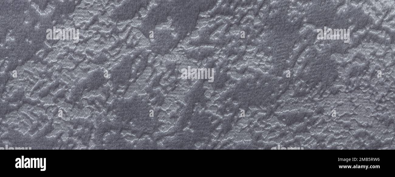 Gray background from a soft upholstery textile material, closeup ...