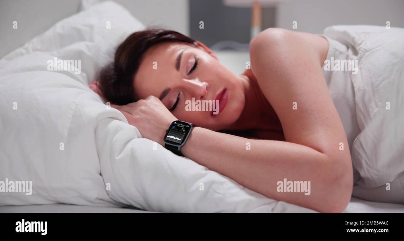 Fitness Activity Tracker With Heartbeat Rate On Woman's Hand Stock ...