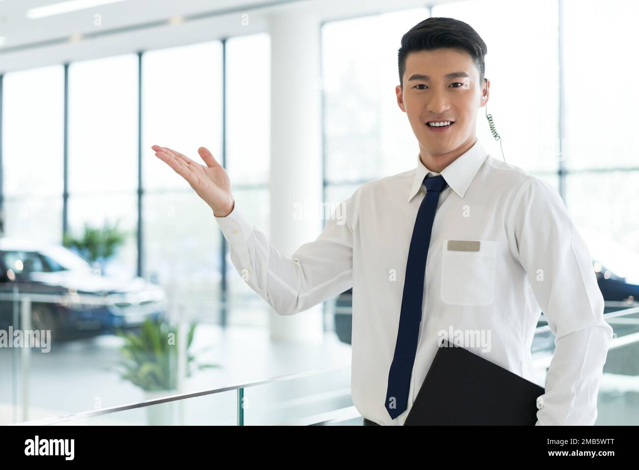 Business young men work in 4 s shop Stock Photo - Alamy