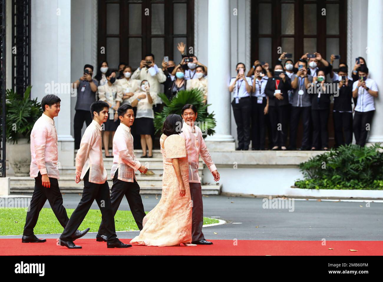 Philippine President Ferdinand Marcos Jr., right, arrives with his ...