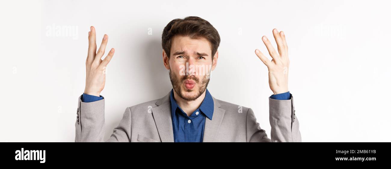 Frustrated businessman shaking hands and asking wtf what happened ...